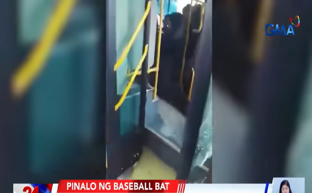 Salamin sa pinto ng pampasaherong bus, nabasag nang hampasin ng babaeng motorista na ...